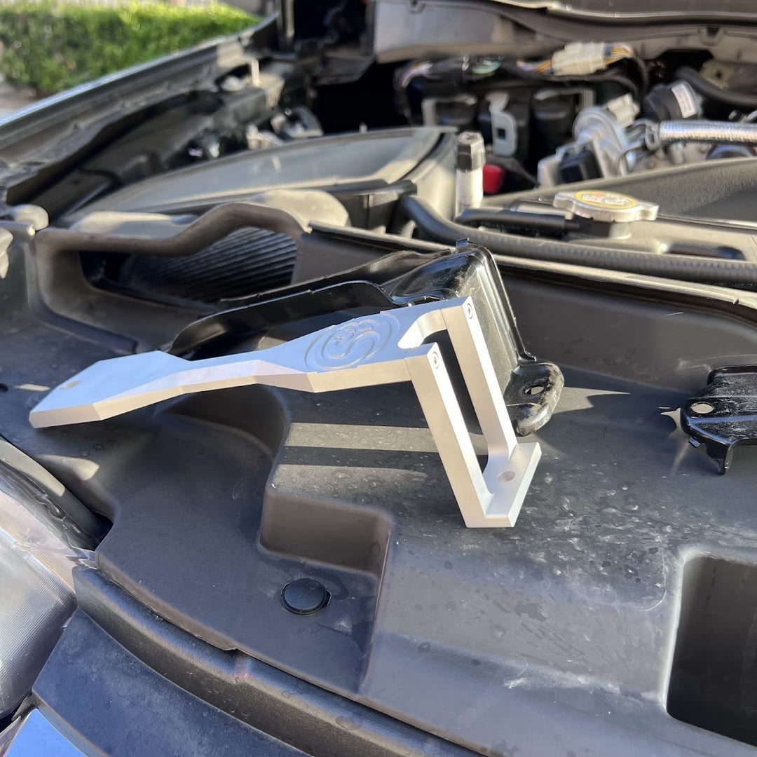 Billet Battery Hold-Down Brackets For 2023-2026 Ford Super Duty, 6.7L – S&B